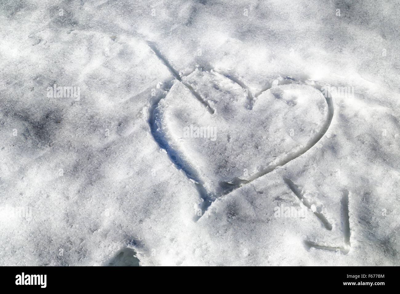Snow heart in hand hi-res stock photography and images - Alamy
