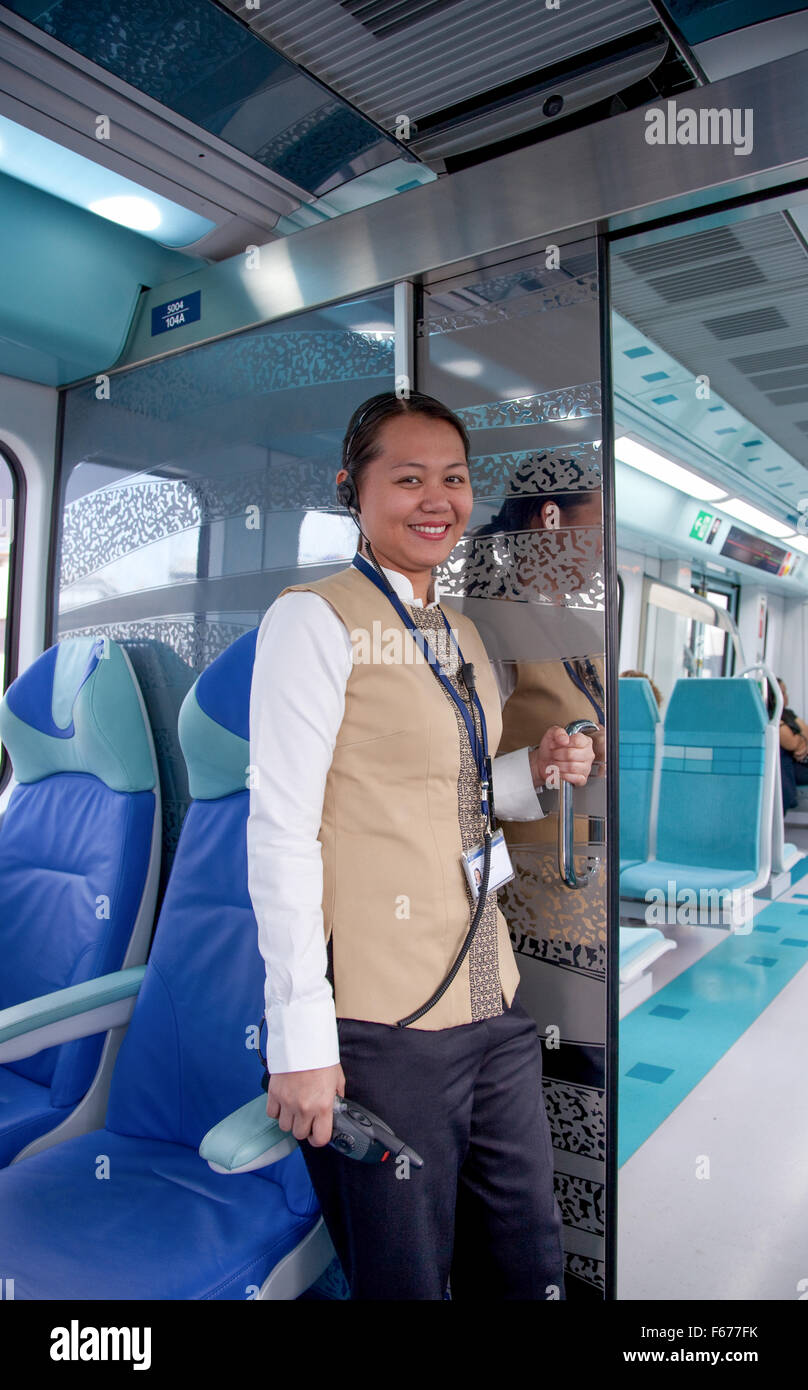Staff assistance in the Dubai Metro Stock Photo - Alamy