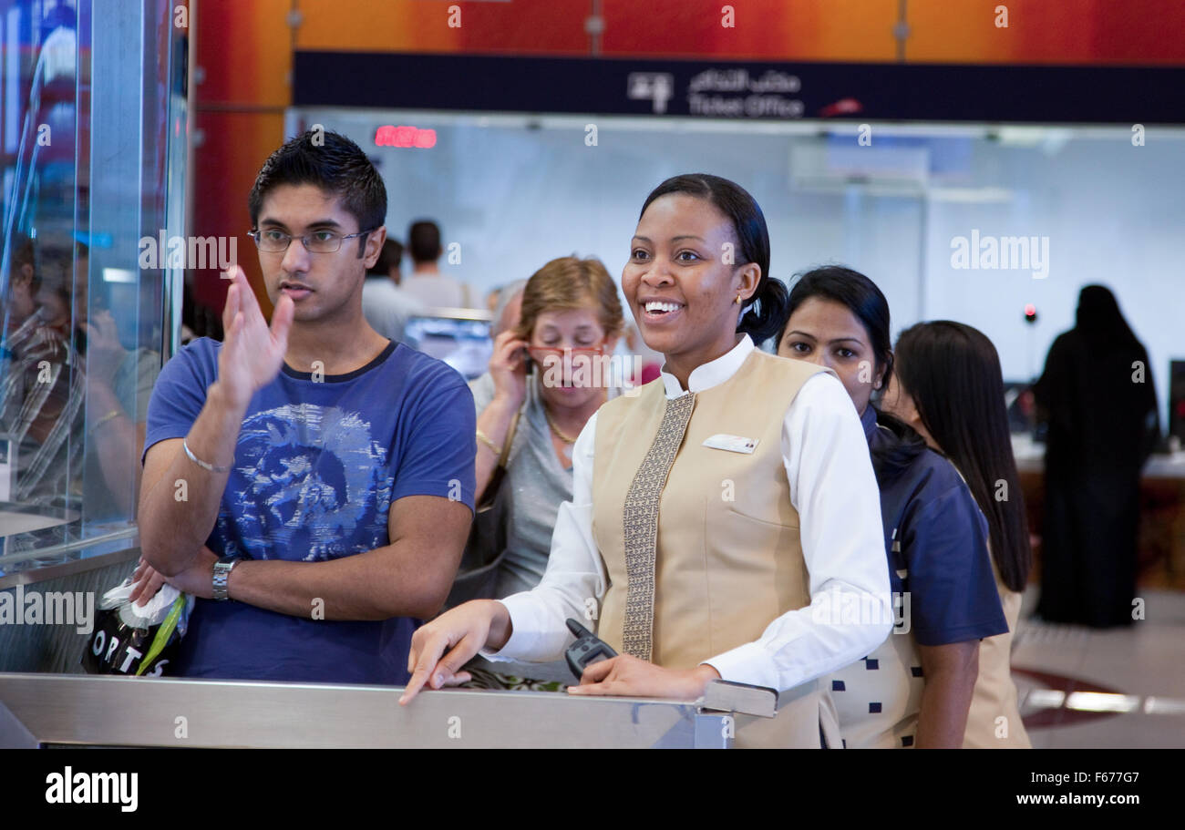 Staff assistance in the Dubai Metro Stock Photo - Alamy