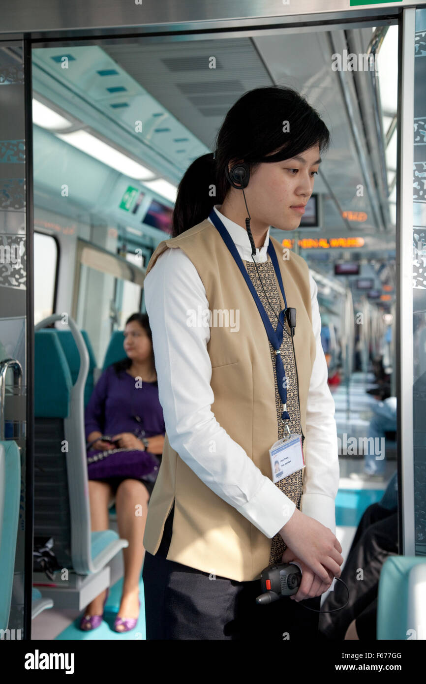 Staff assistance in the Dubai Metro Stock Photo - Alamy