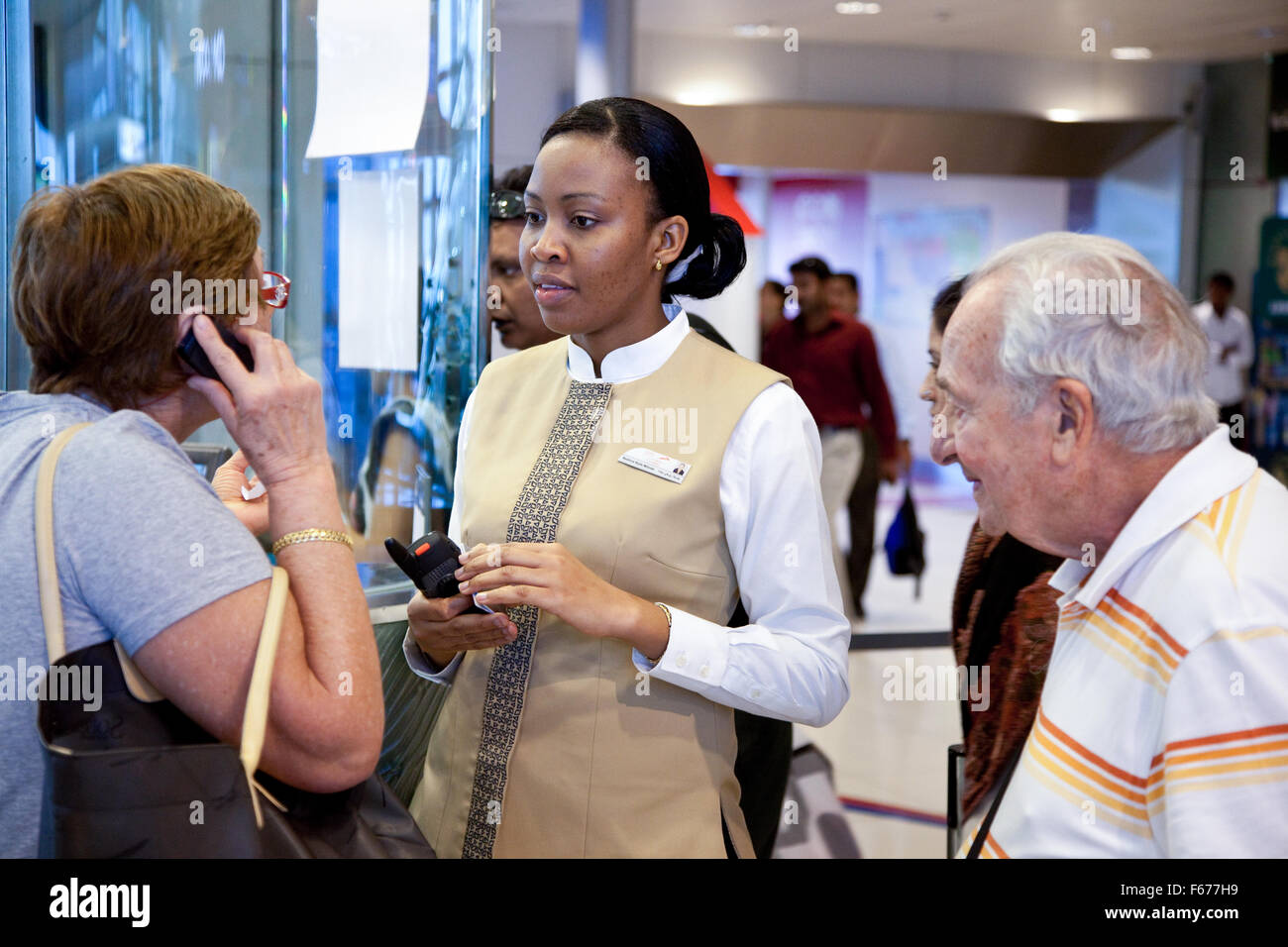 Staff assistance in the Dubai Metro Stock Photo - Alamy