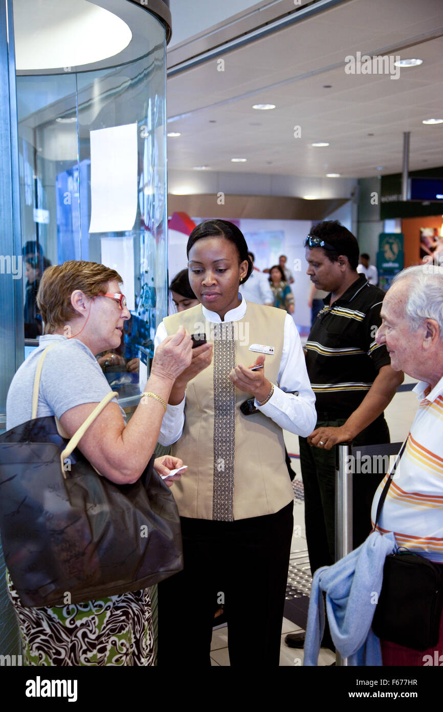 Staff assistance in the Dubai Metro Stock Photo - Alamy