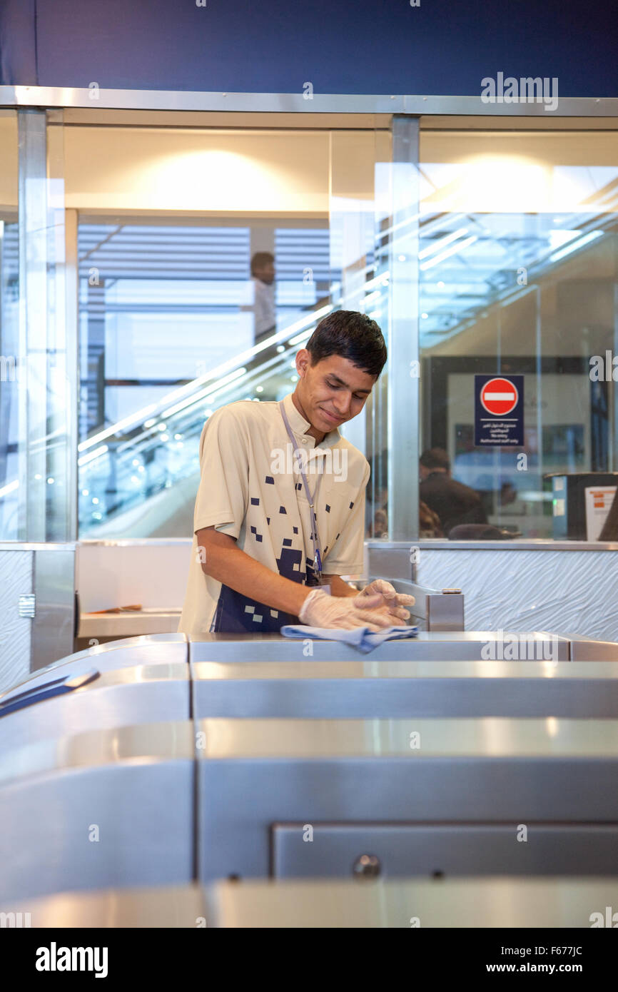 Staff assistance in the Dubai Metro Stock Photo - Alamy