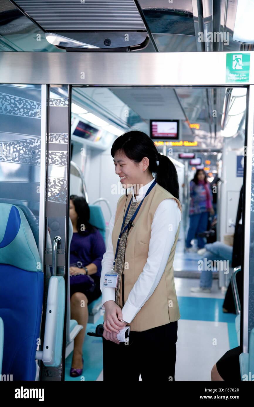 Staff assistance in the Dubai Metro Stock Photo - Alamy