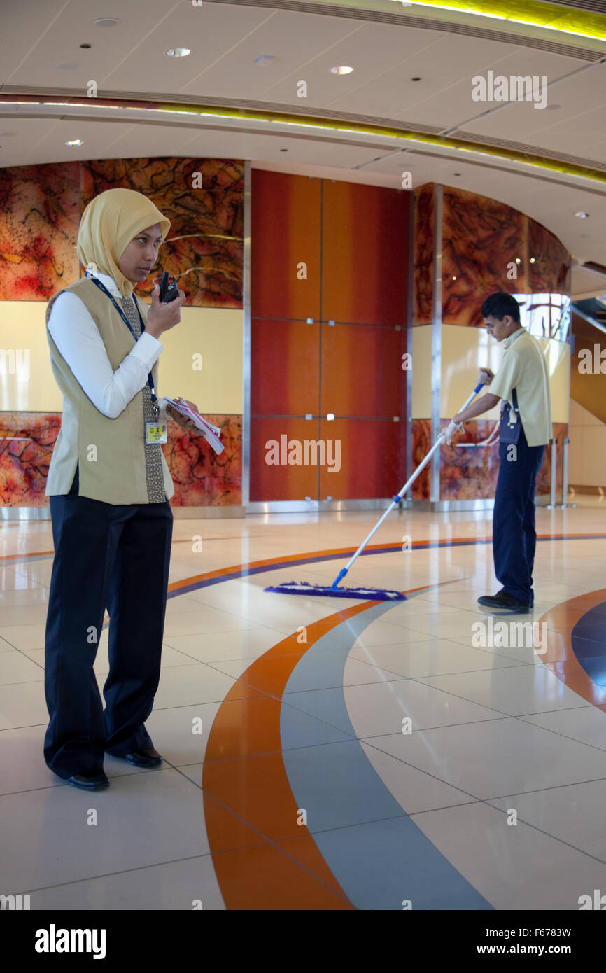 Staff assistance in the Dubai Metro Stock Photo - Alamy