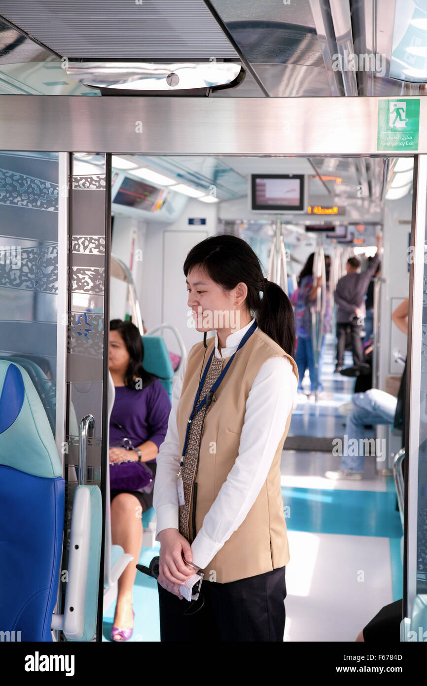 Staff assistance in the Dubai Metro Stock Photo - Alamy