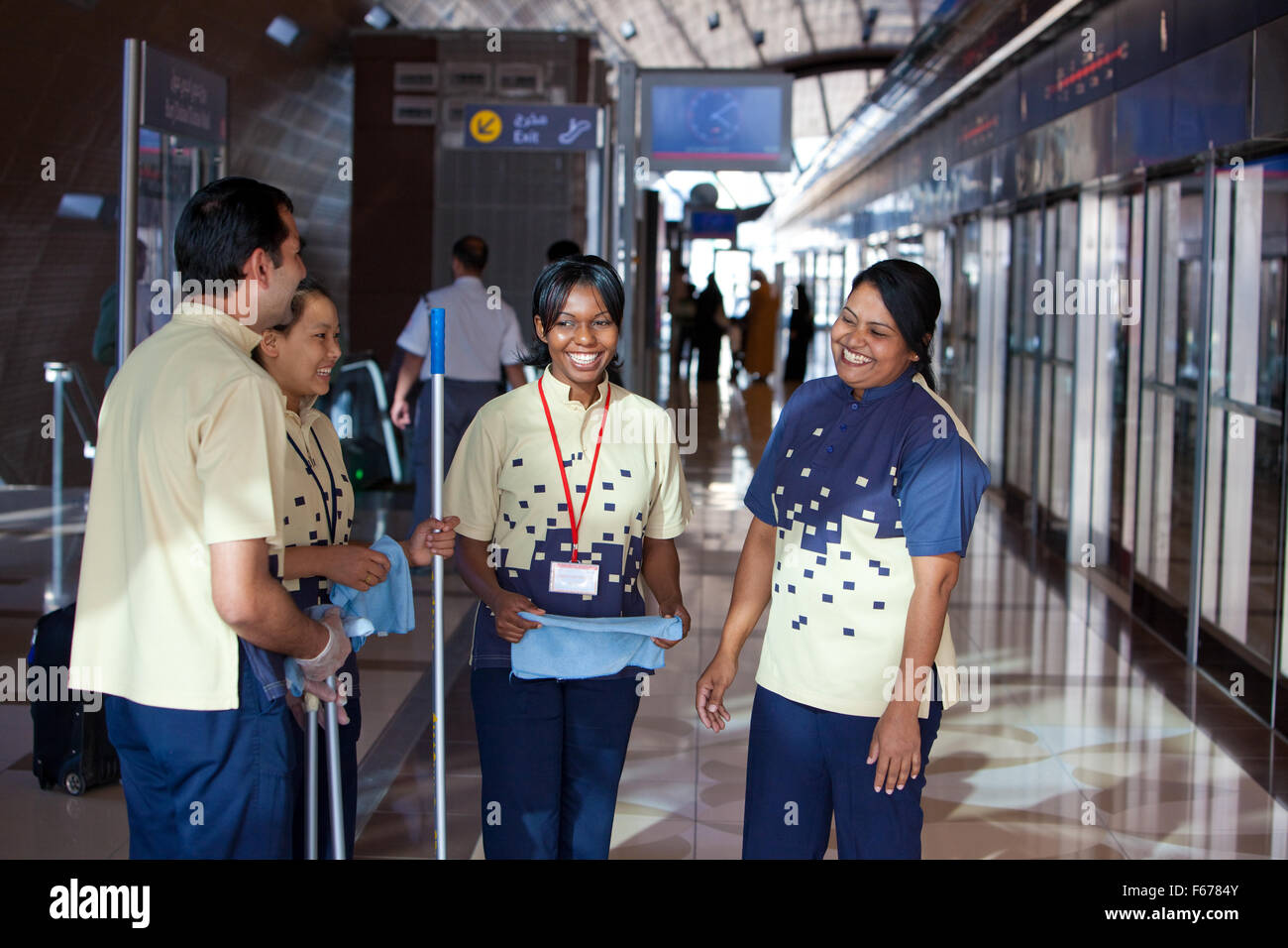 Dubai Metro cleaning staff Stock Photo - Alamy
