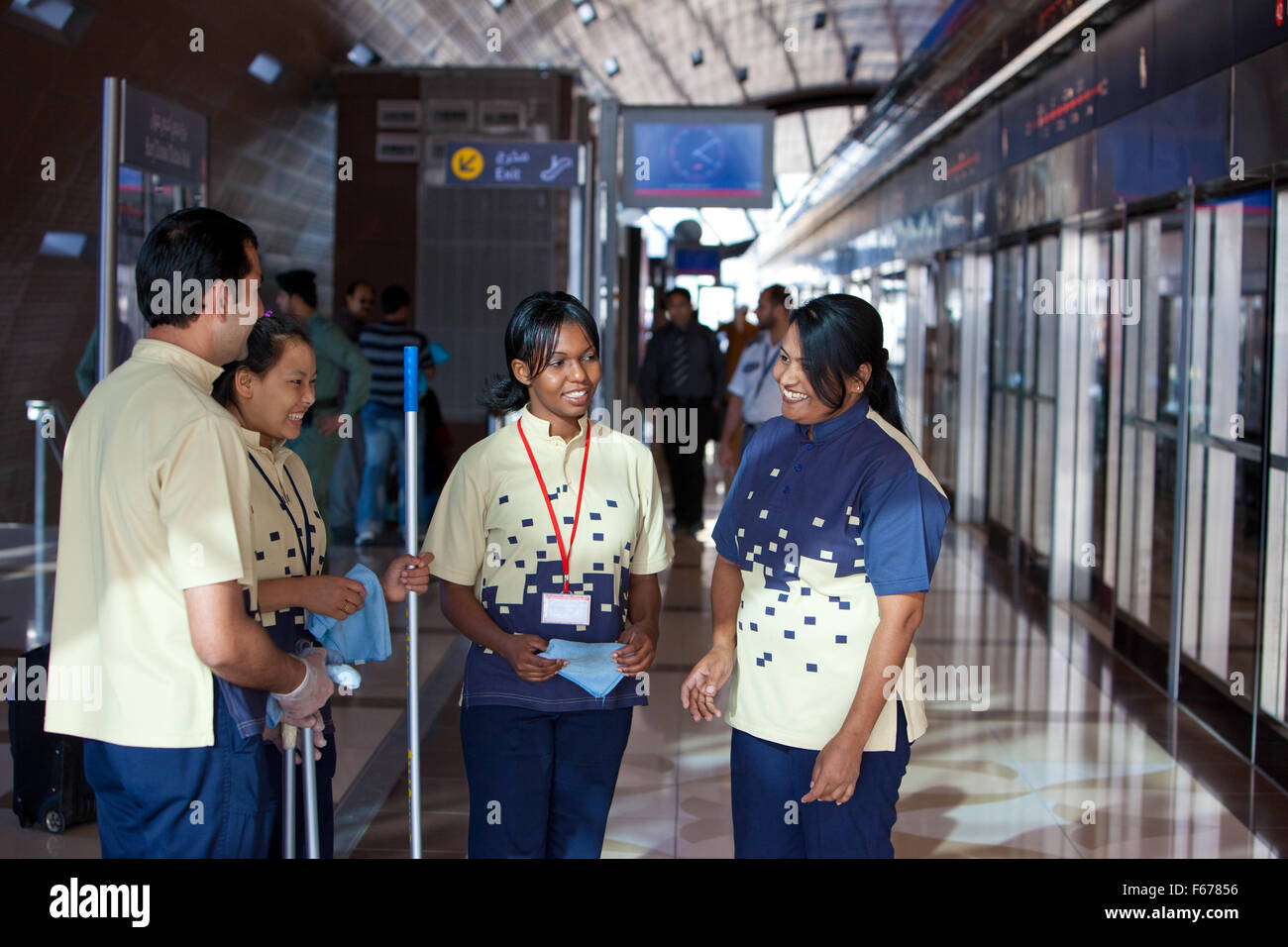 Dubai Metro cleaning staff Stock Photo - Alamy