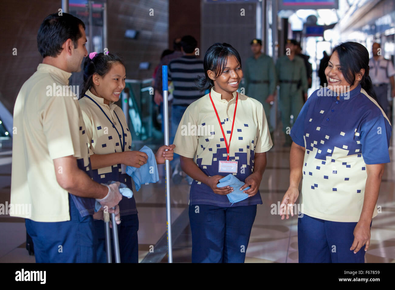 Dubai Metro cleaning staff Stock Photo - Alamy