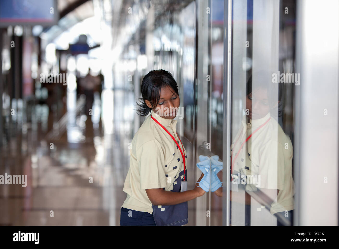 Dubai Metro cleaning staff Stock Photo - Alamy
