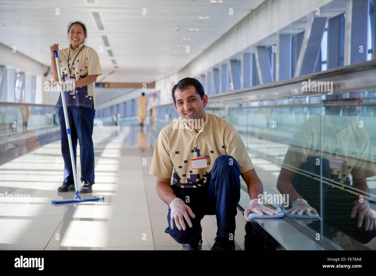 Dubai Metro cleaning staff Stock Photo - Alamy