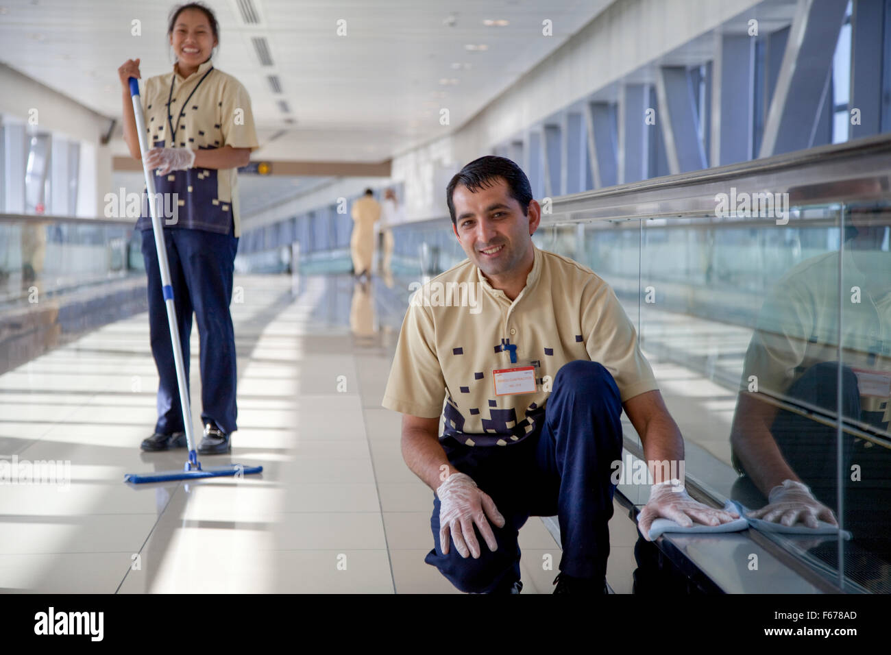 Dubai Metro cleaning staff Stock Photo - Alamy
