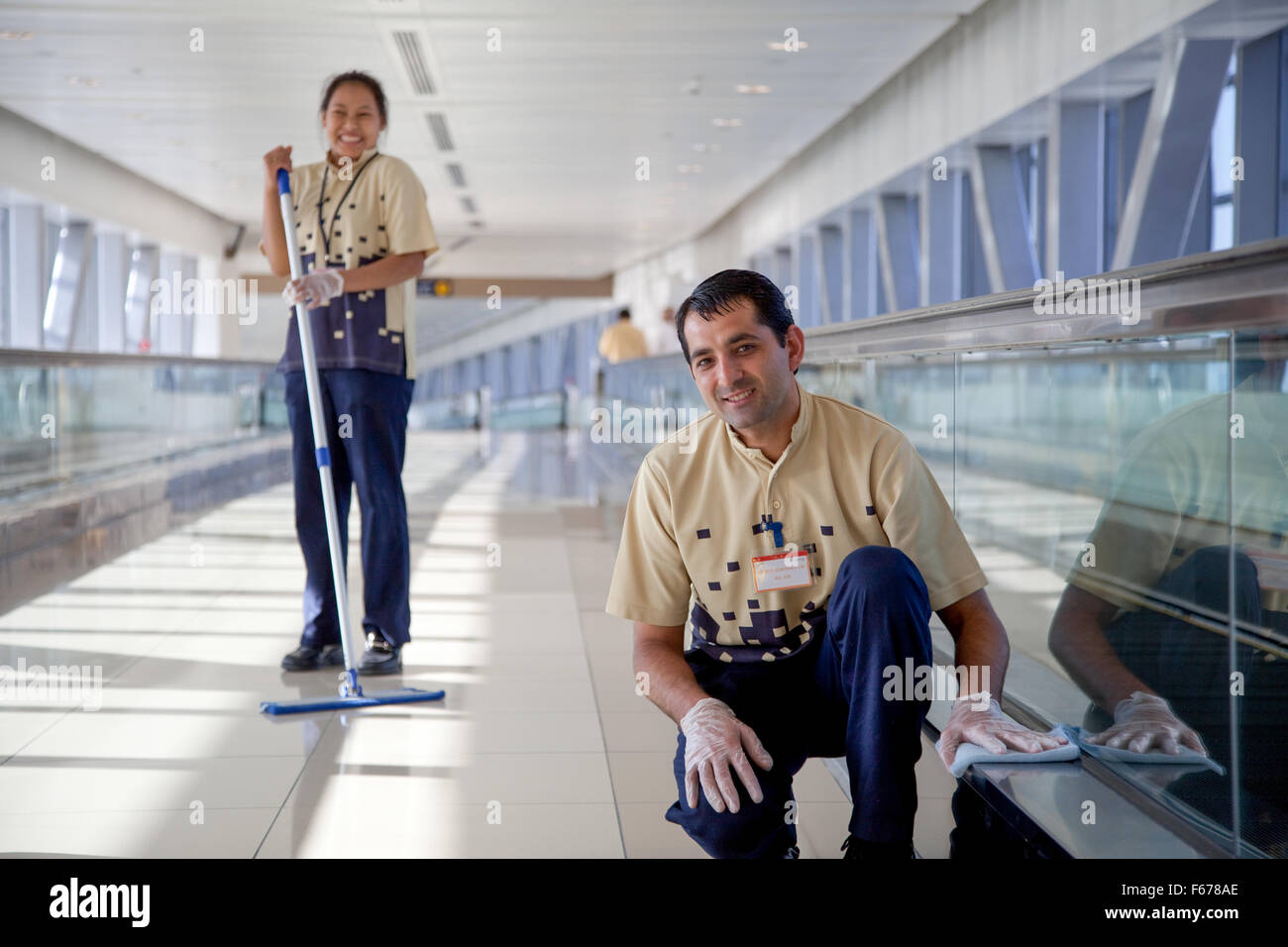 Dubai Metro cleaning staff Stock Photo - Alamy