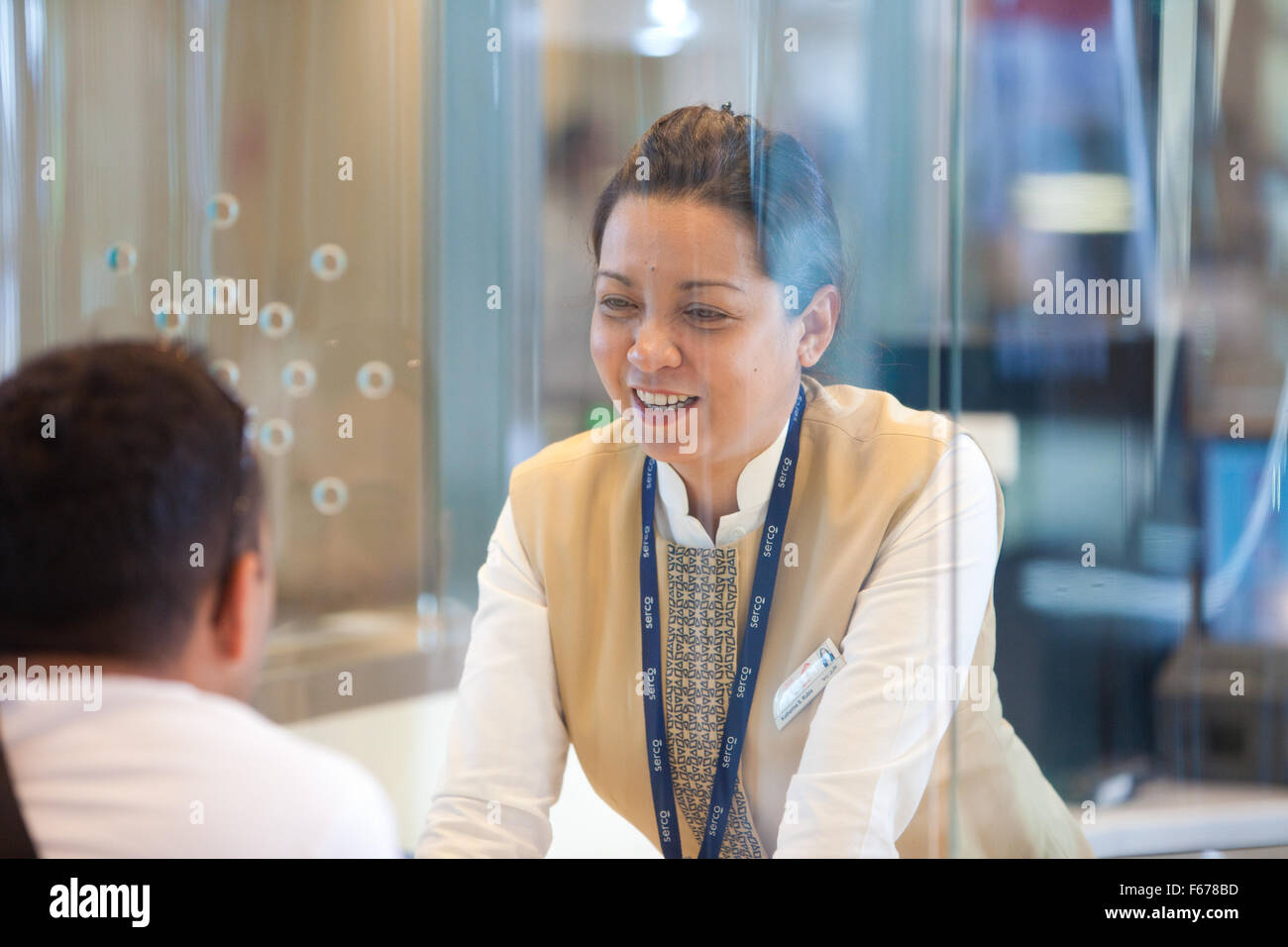 Ticket sales office staff in the Dubai Metro Stock Photo - Alamy