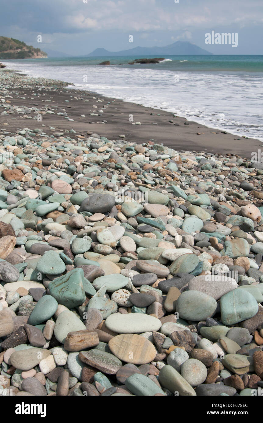 Blue pebbles at Pengajawa beach Flores Indonesia 02-12-2012 Stock Photo ...