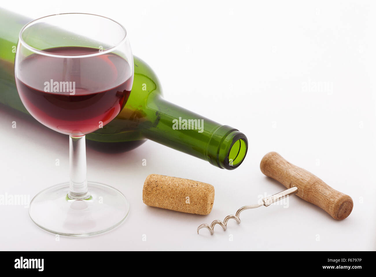 Glass and bottle of red wine. Top view unusually on white background ...