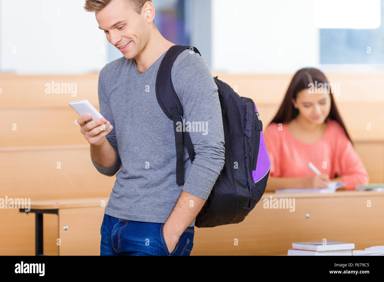 Teenage schoolboy texting hi-res stock photography and images - Alamy