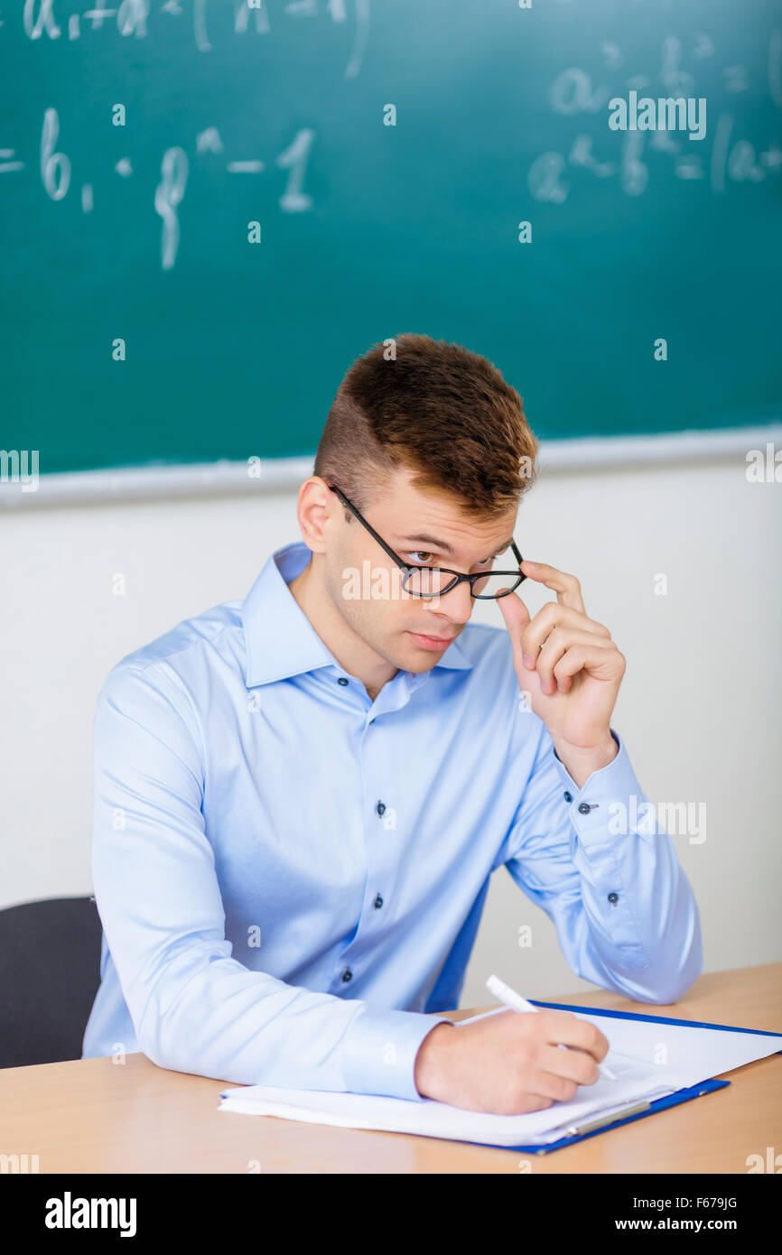 Checking attendance hi-res stock photography and images - Alamy