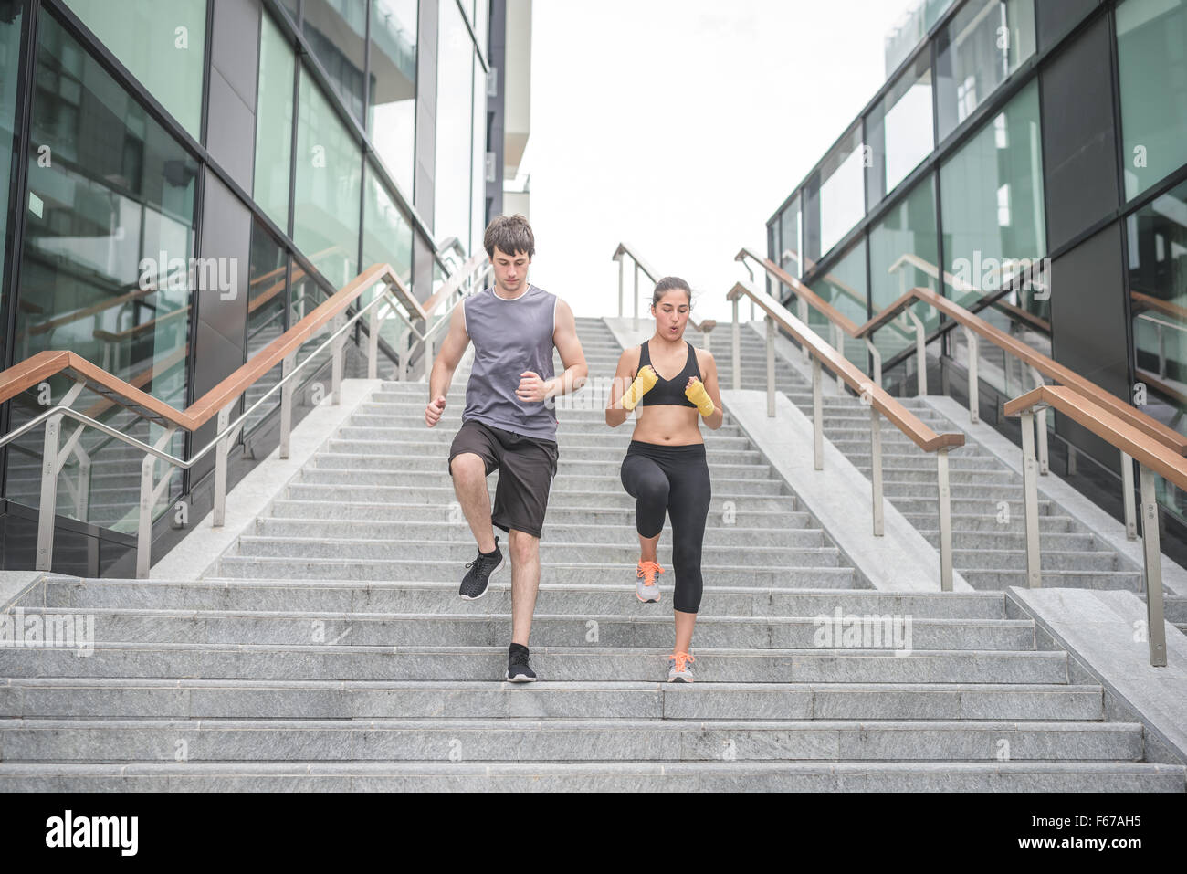 Man running downstairs hi-res stock photography and images - Alamy