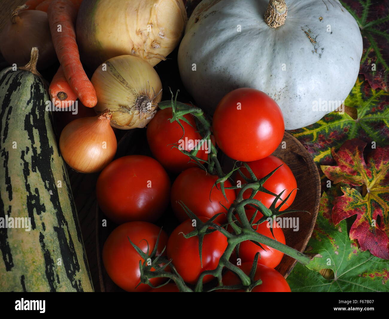 Rustic Vegetables and Grapevine leaves Stock Photo - Alamy