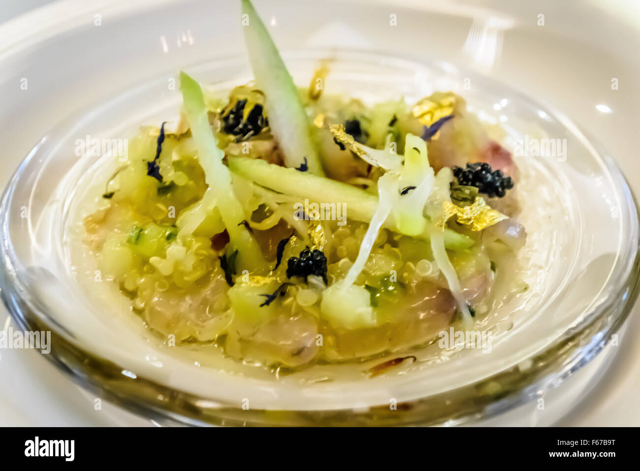 Sea Bass Carpaccio with Caviar and Green Apple Powder Stock Photo - Alamy