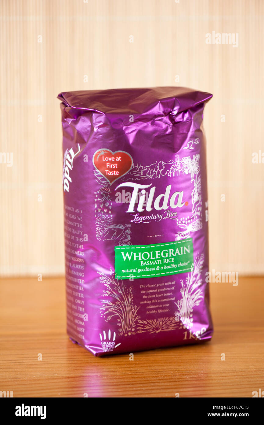 Tilda wholegrain basmati rice product in 1kg pink plastic pack, packed ...