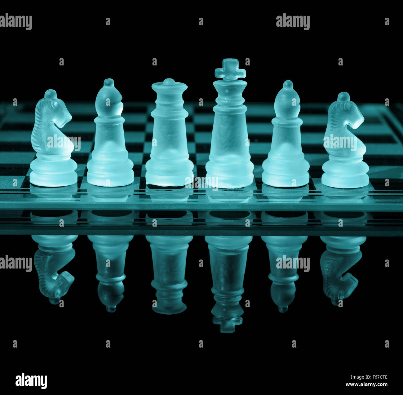 Chess pieces on check board with reflection and blue tone Stock Photo ...