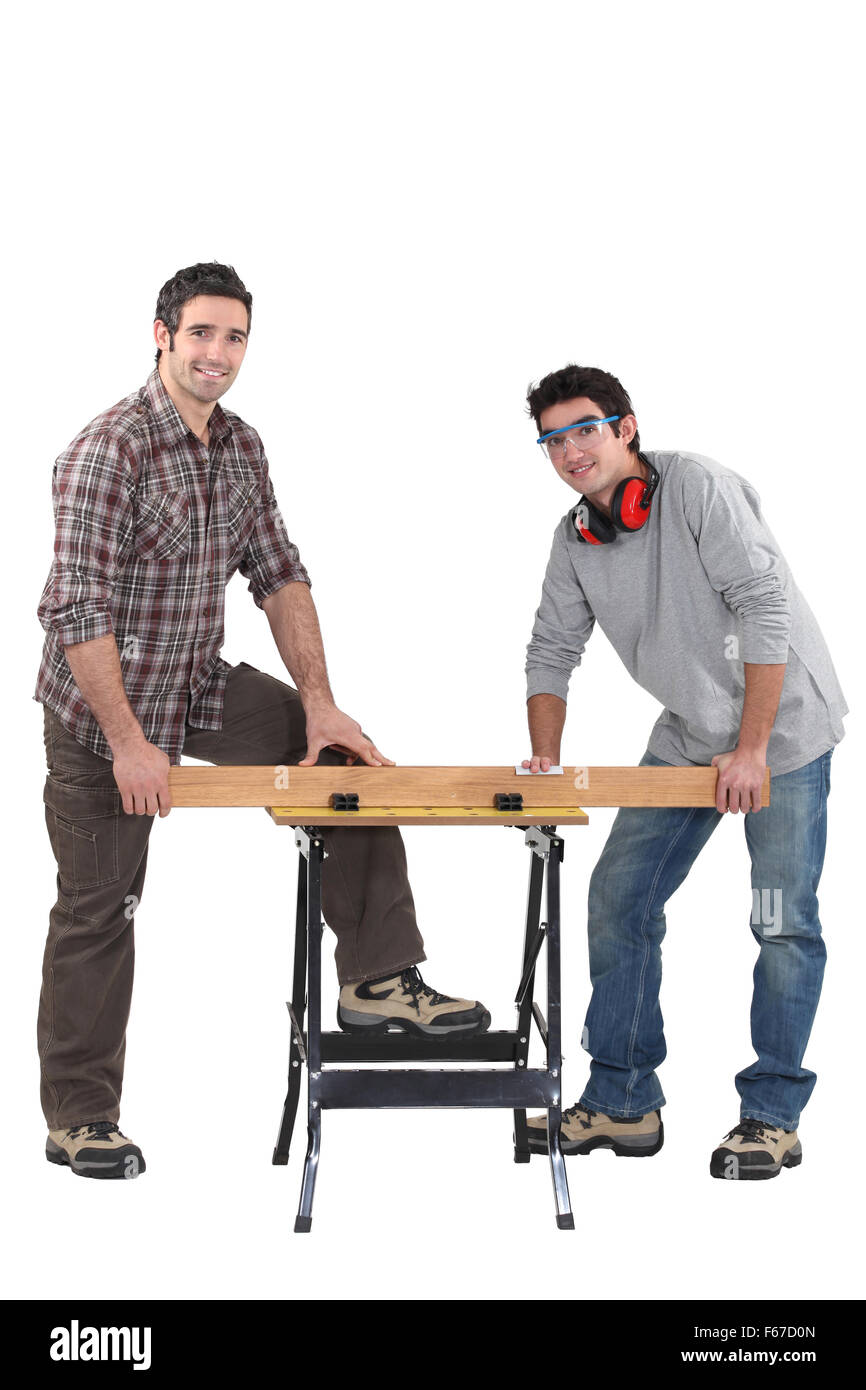 Carpenters working at a bench Stock Photo - Alamy