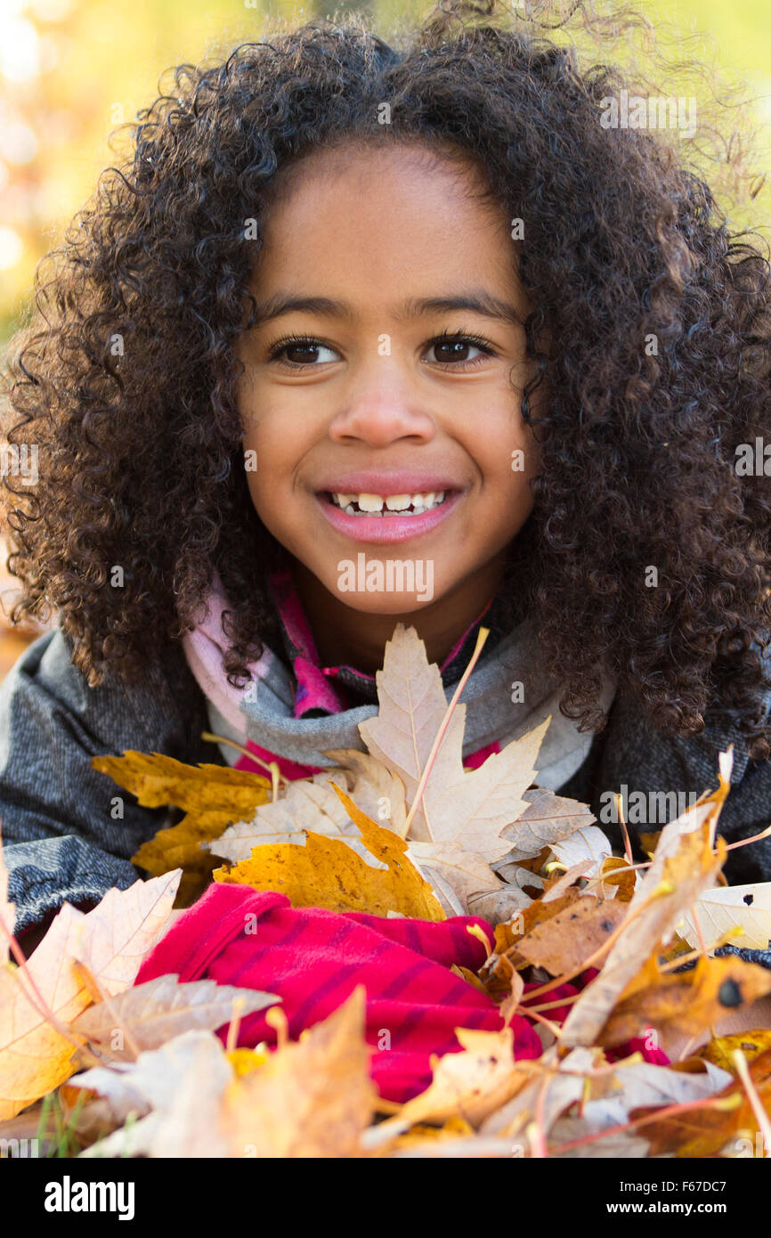 Child on autumn season portrait Stock Photo - Alamy