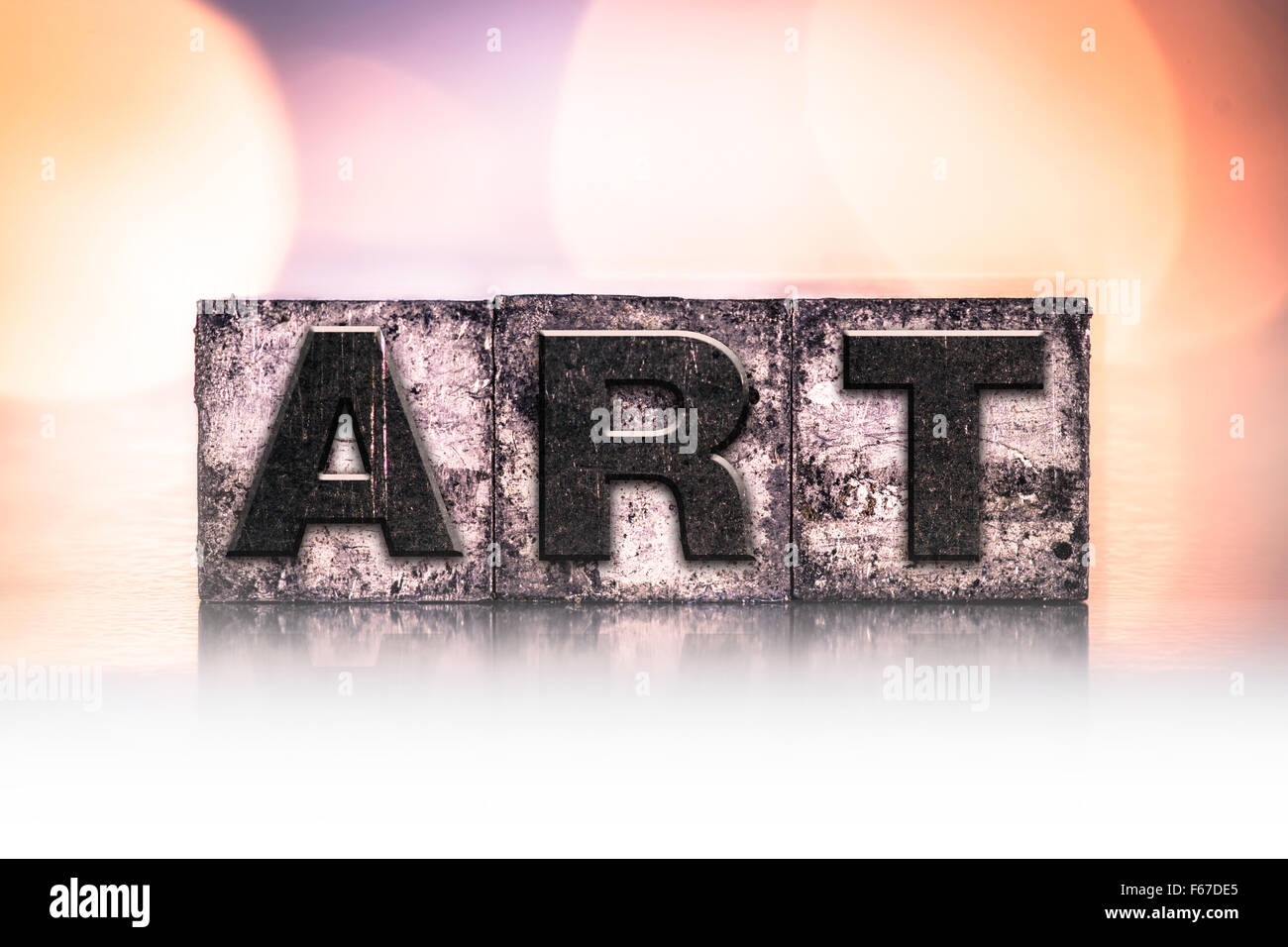 The word "ART" written in vintage ink stained letterpress type Stock ...