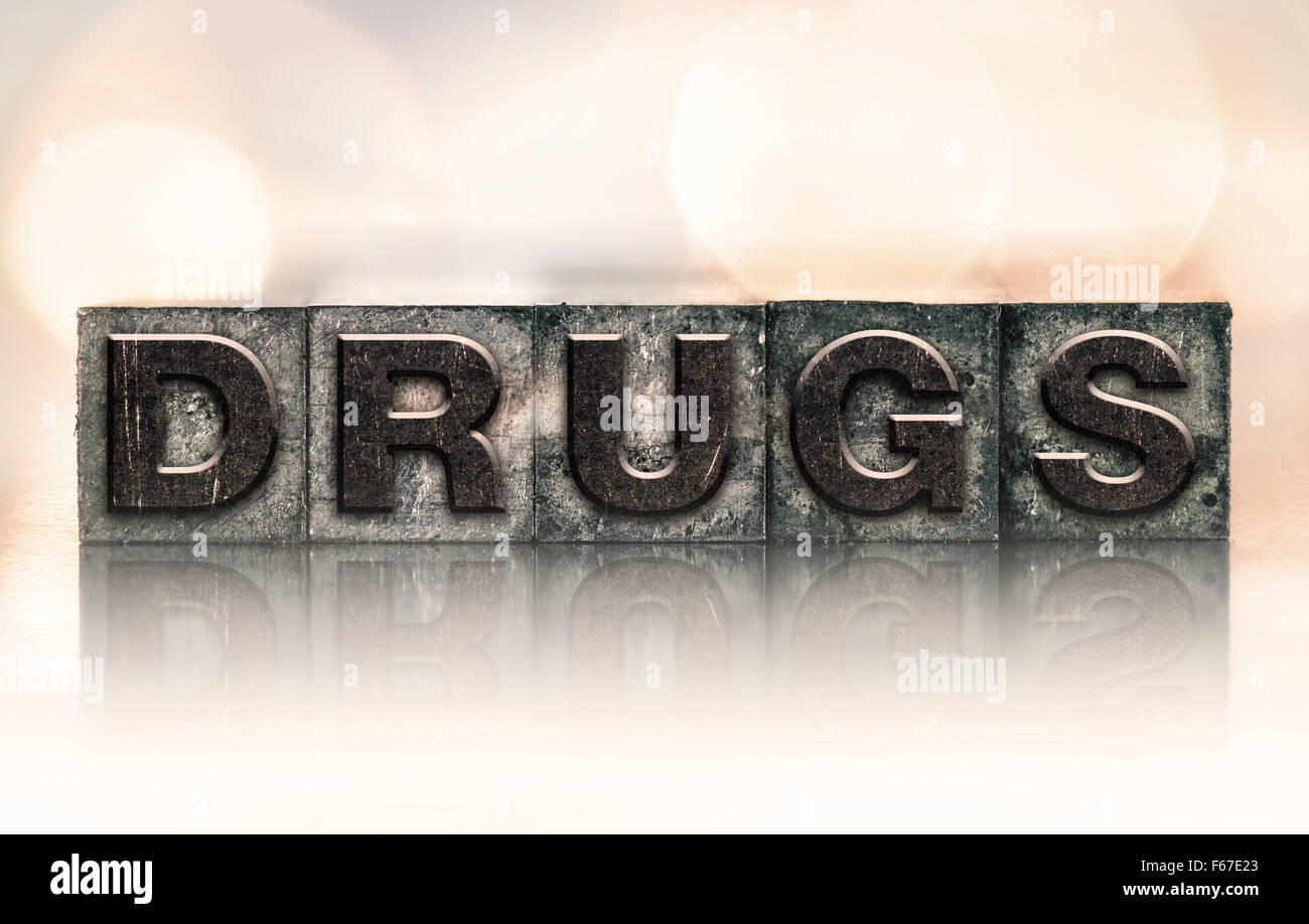 The word "DRUGS" written in vintage ink stained letterpress type Stock ...