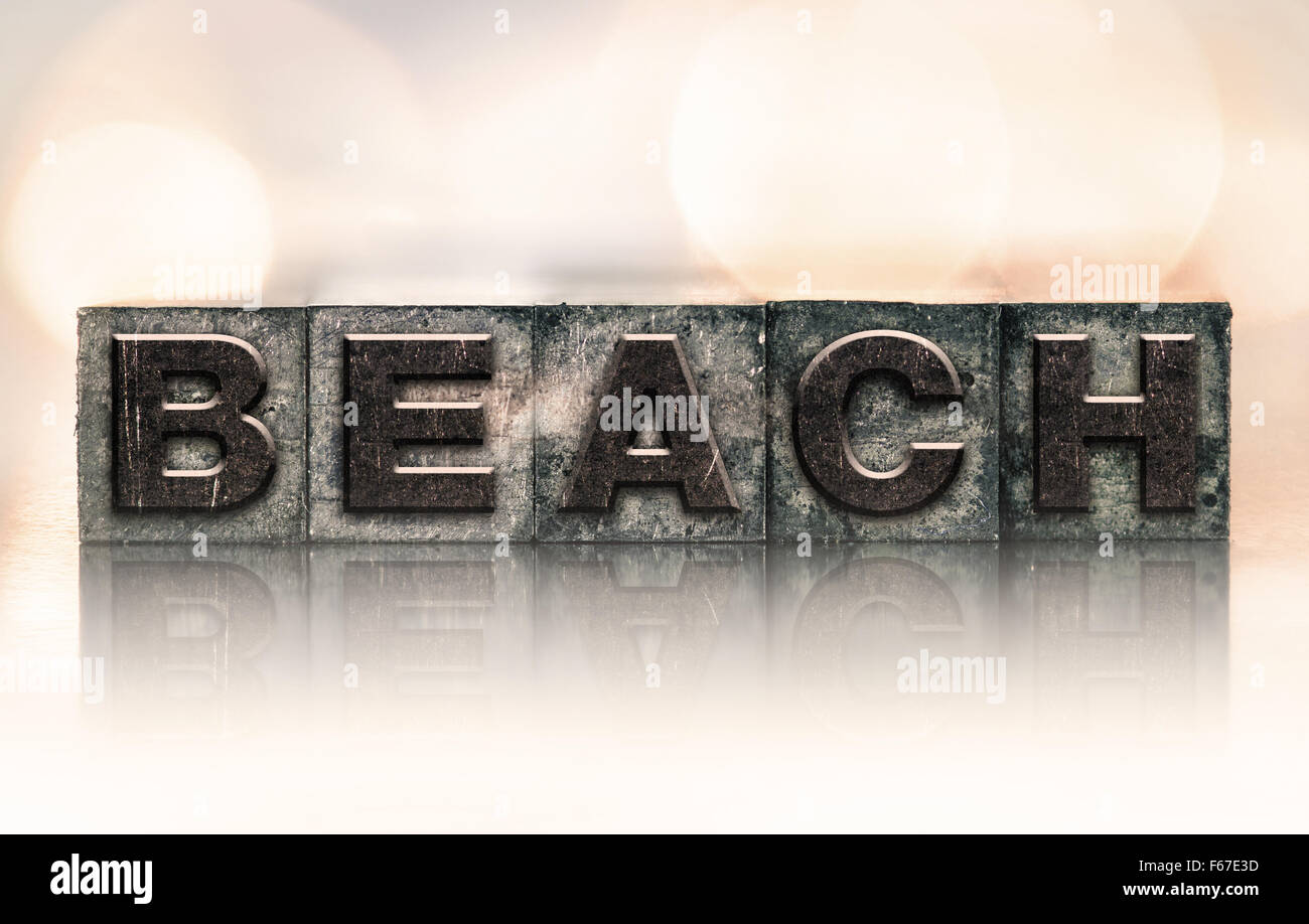 The word "BEACH" written in vintage ink stained letterpress type Stock ...