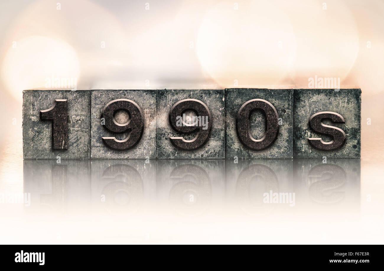 The word "1990s" written in vintage ink stained letterpress type Stock ...