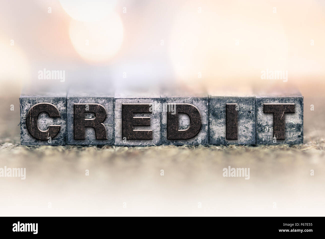 The word "CREDIT" written in vintage ink stained letterpress type Stock ...
