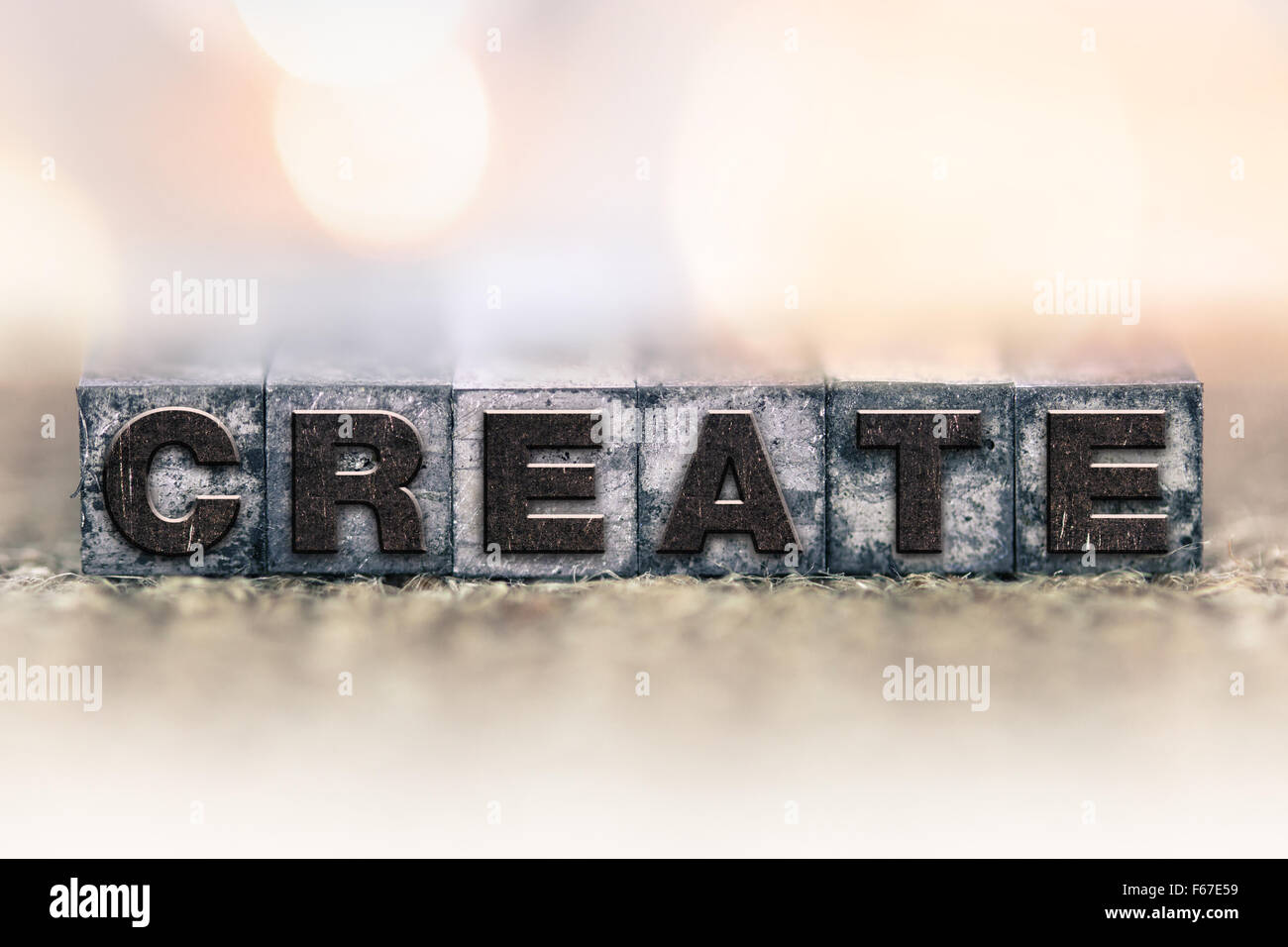 The word "CREATE" written in vintage ink stained letterpress type Stock ...