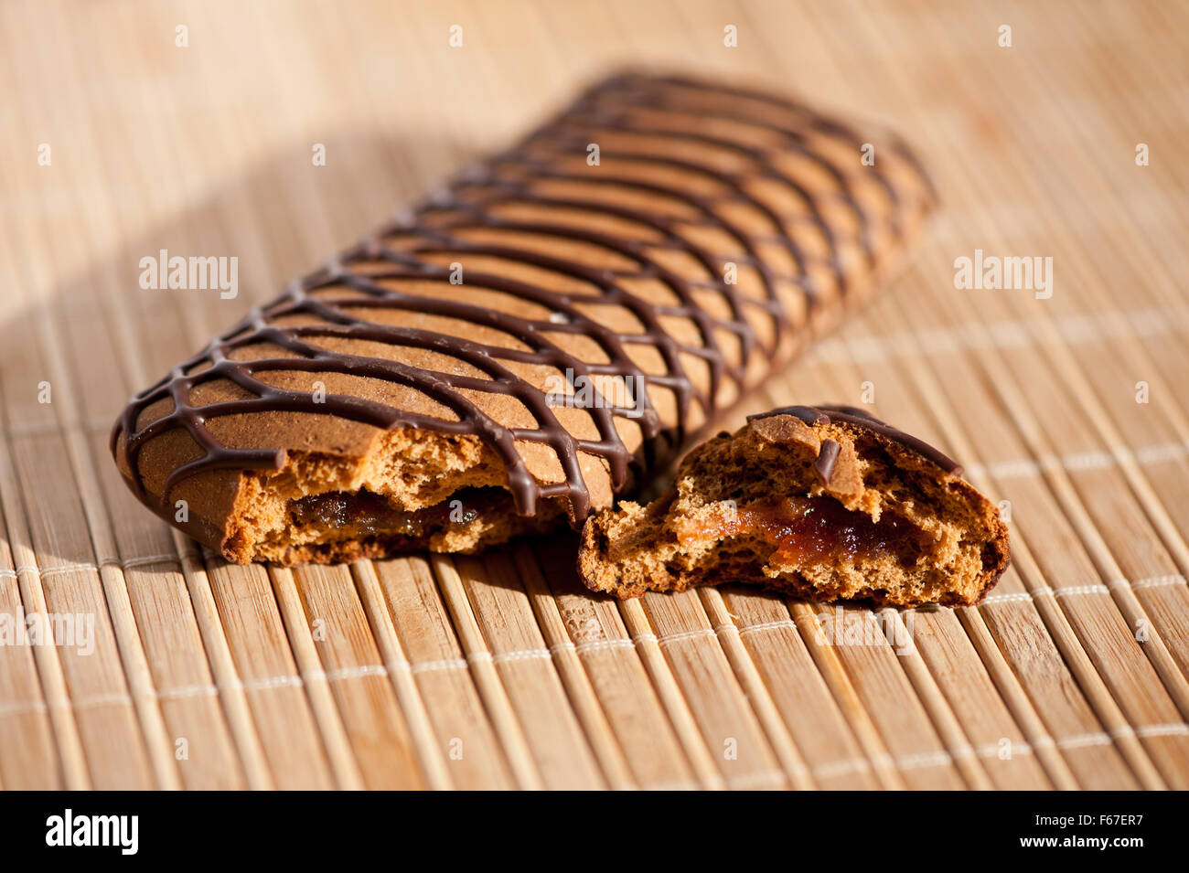 Nibbled gingerbread sweet bar bit, snack decorated with chocolate ...