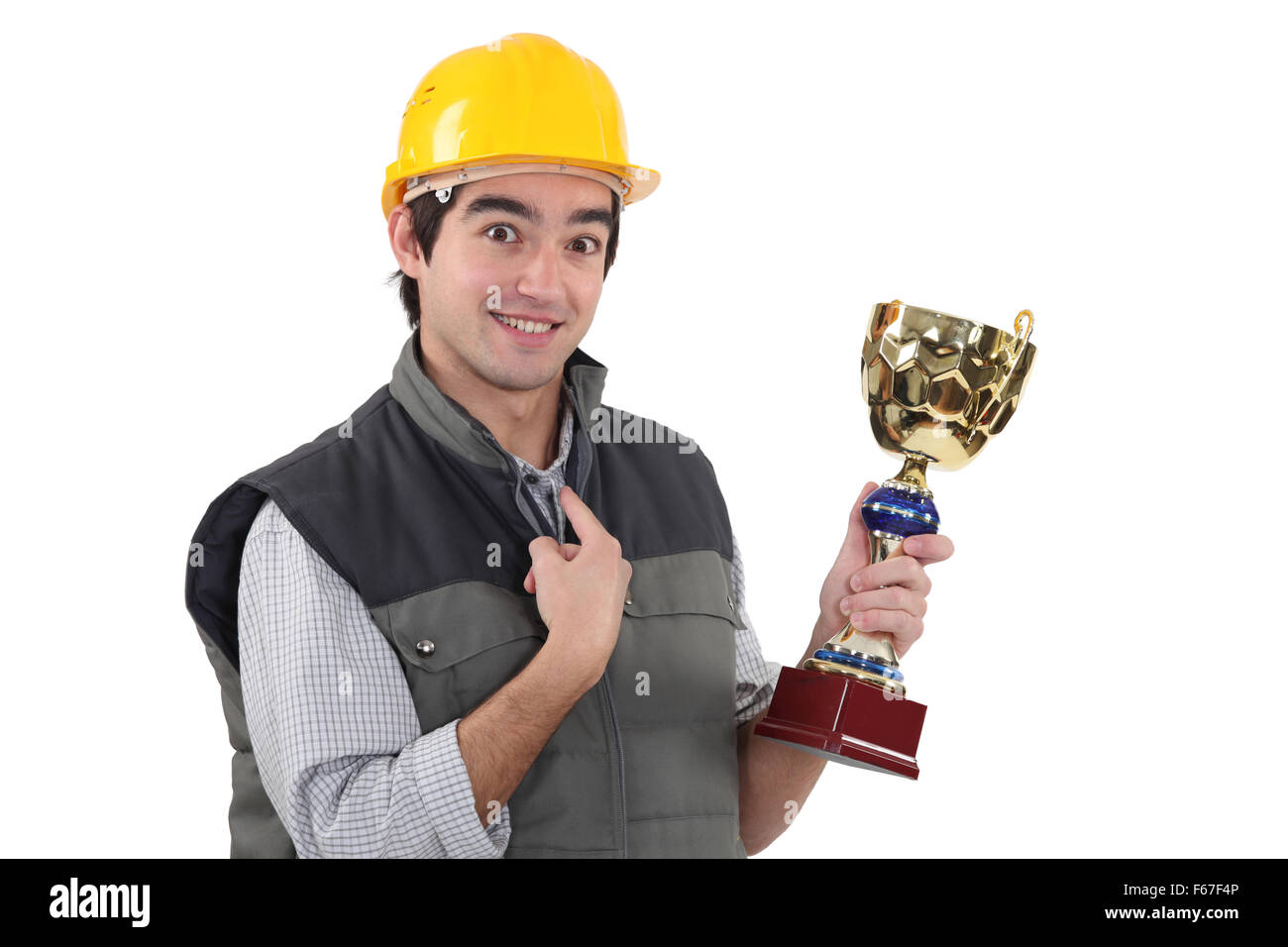 craftsman holding a trophy Stock Photo - Alamy