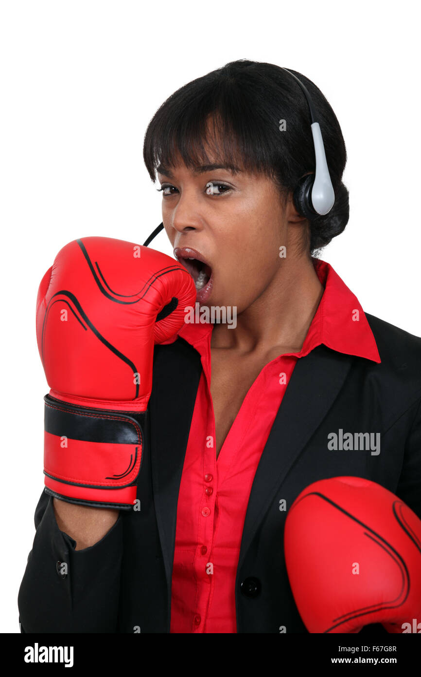 A black businesswoman yawning Stock Photo - Alamy