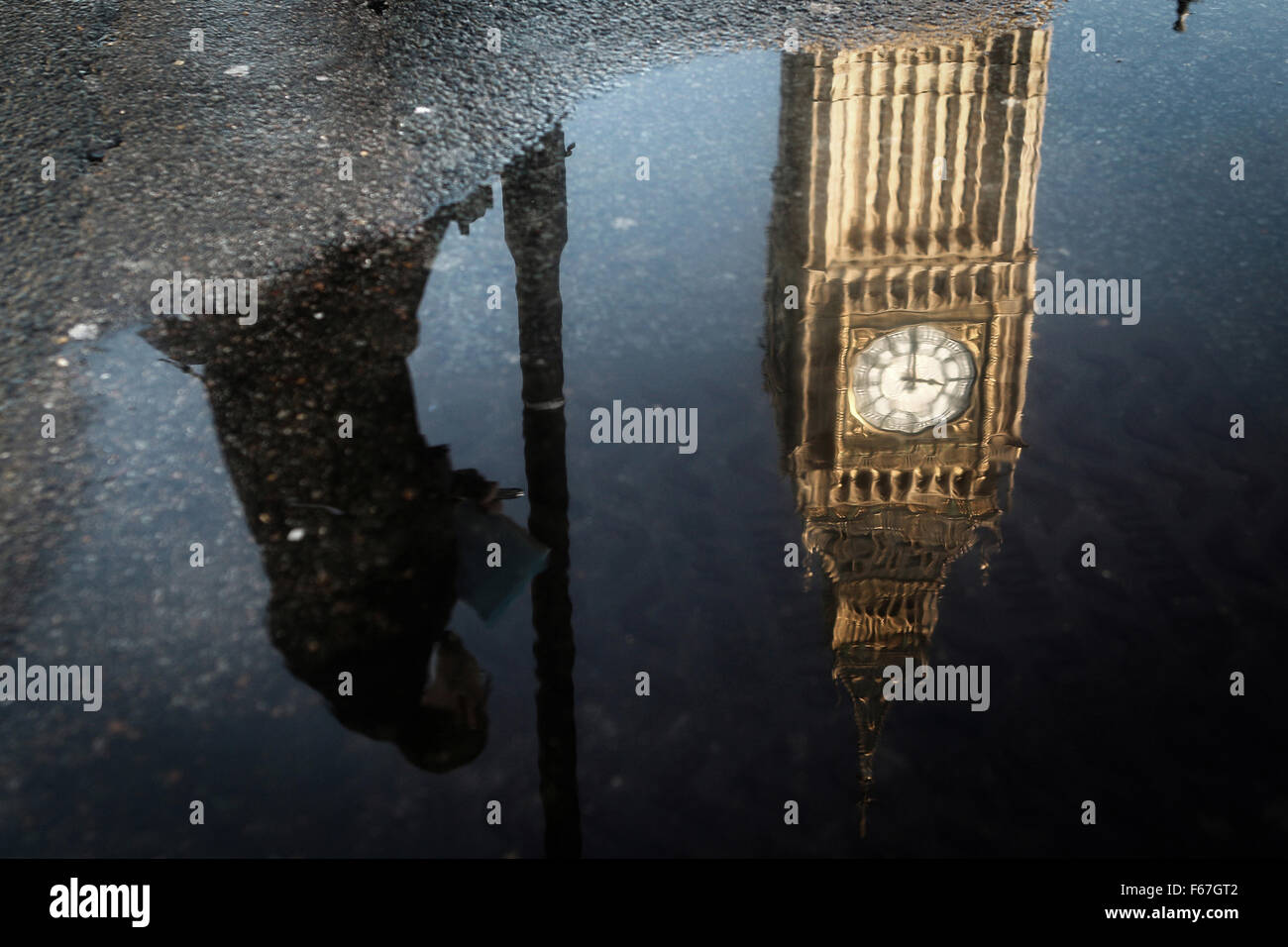 London (England, UK), on 2015/01/08: Big Ben reflected in a puddle ...