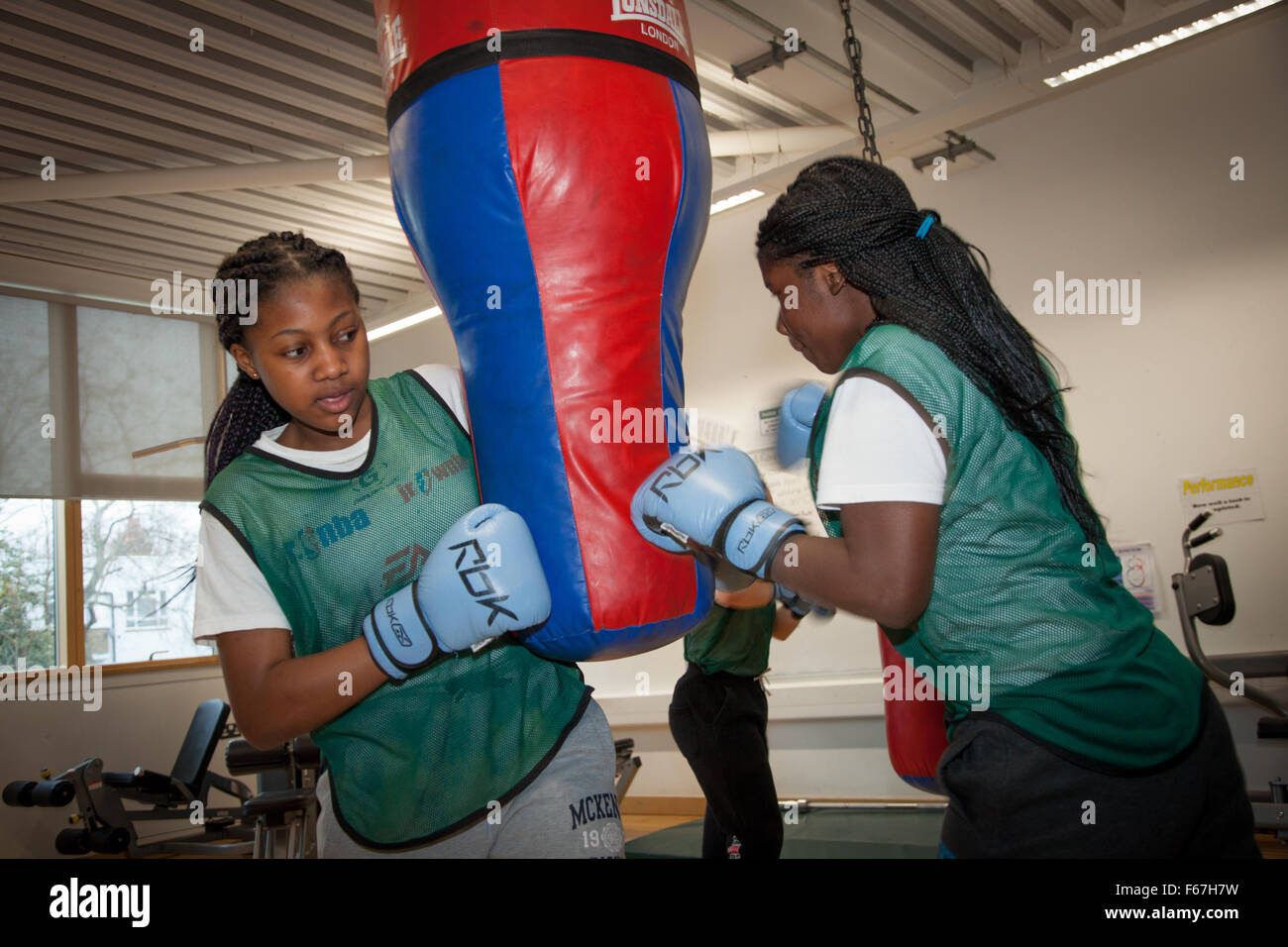 Female teenager students being coached in boxing Stock Photo - Alamy