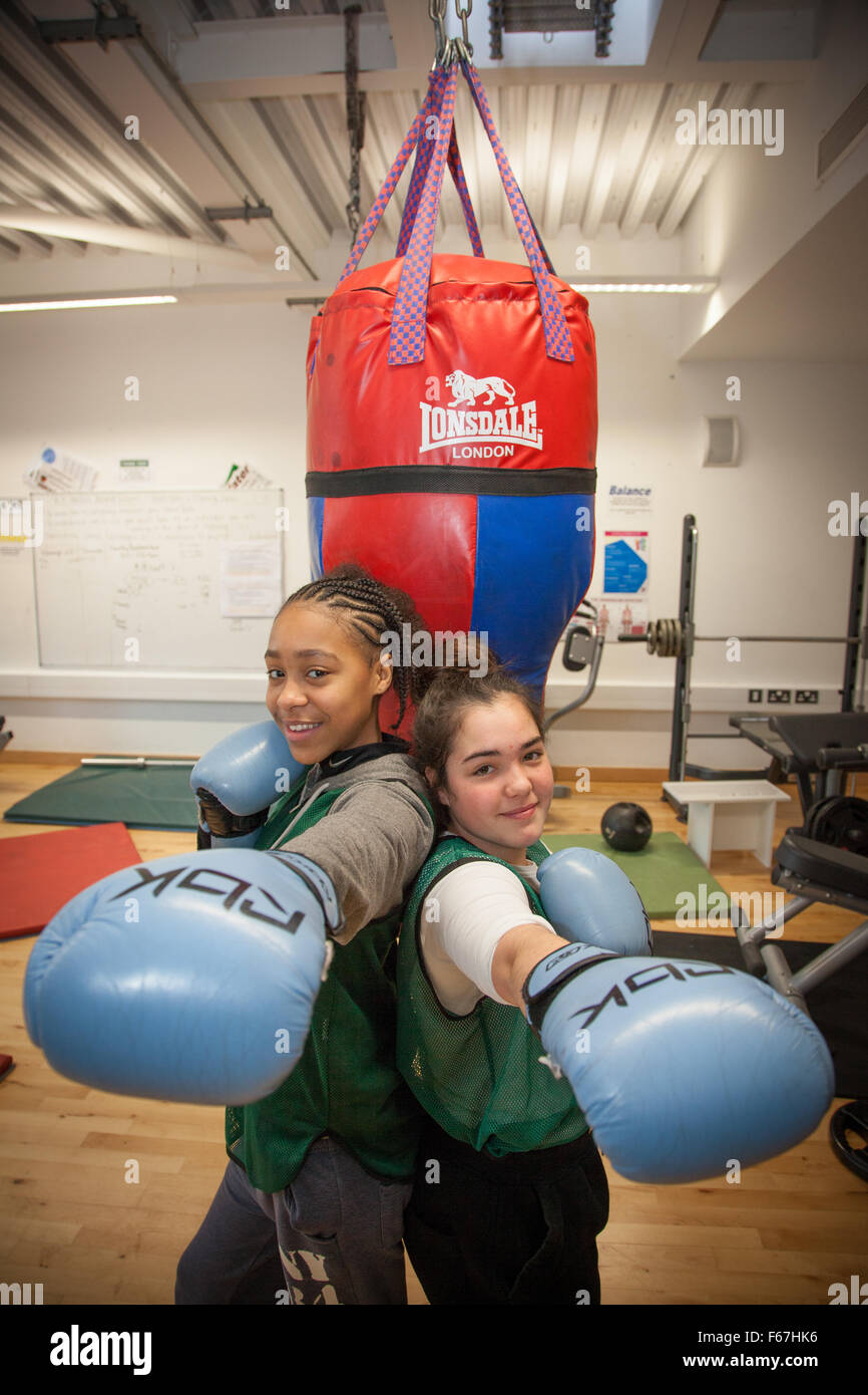 Female teenager students being coached in boxing Stock Photo - Alamy