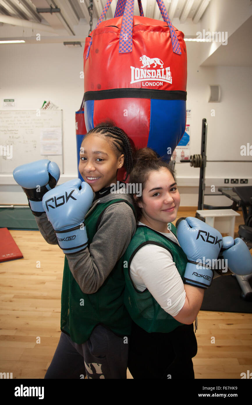 Female teenager students being coached in boxing Stock Photo - Alamy