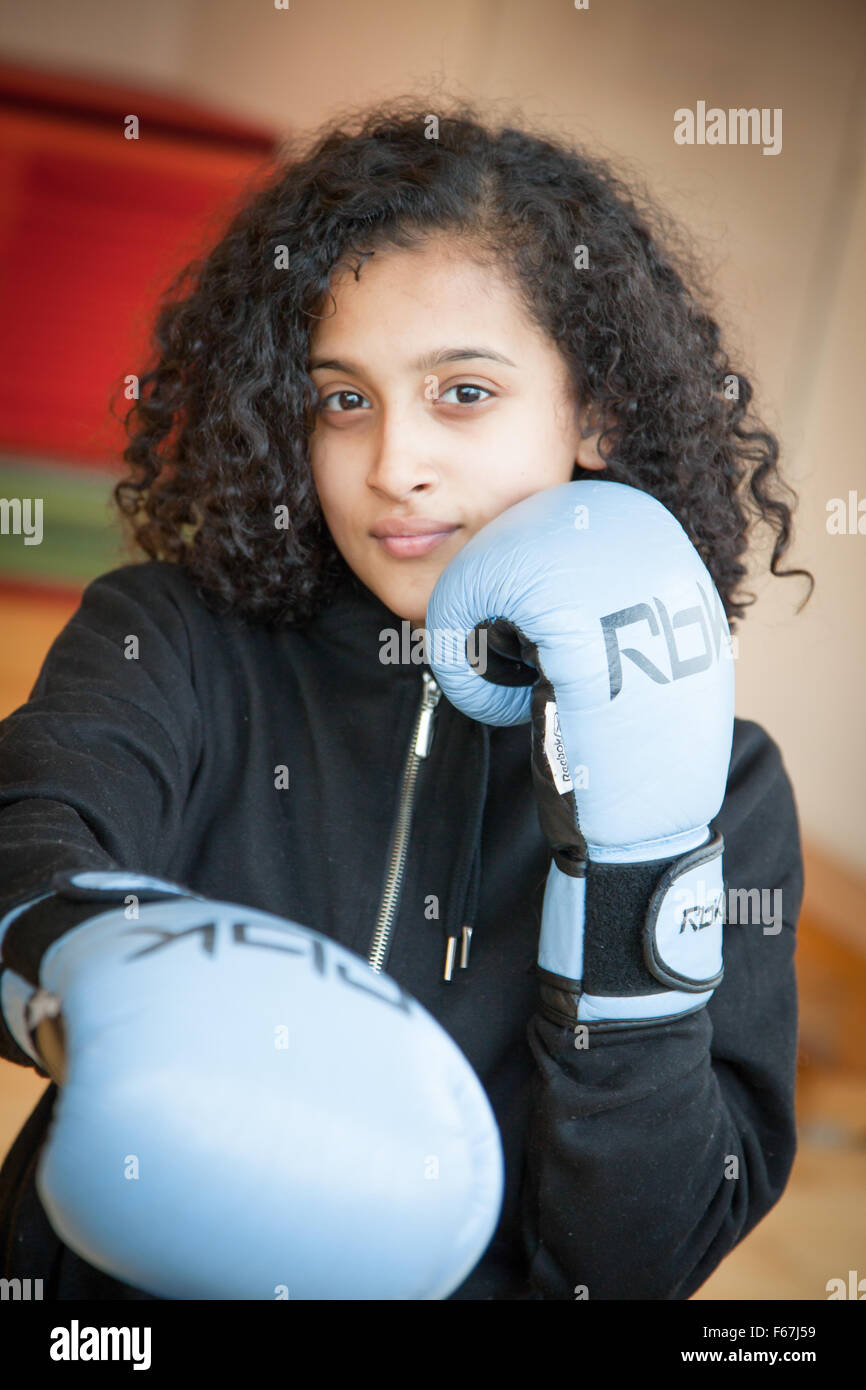 Mixed race teenage female boxer Stock Photo - Alamy