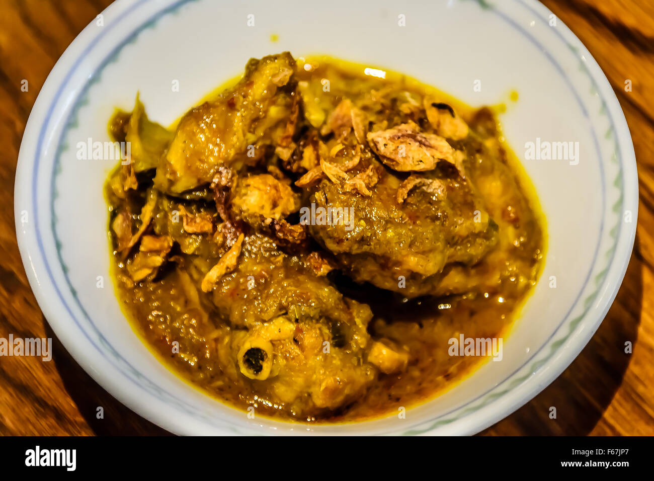 Kari Kapitan Sakura chicken braised in authentic Penang Nyonya curry ...