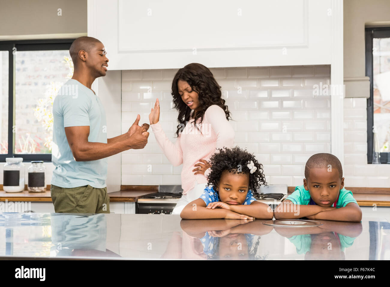 Parents arguing in front children hi-res stock photography and images ...