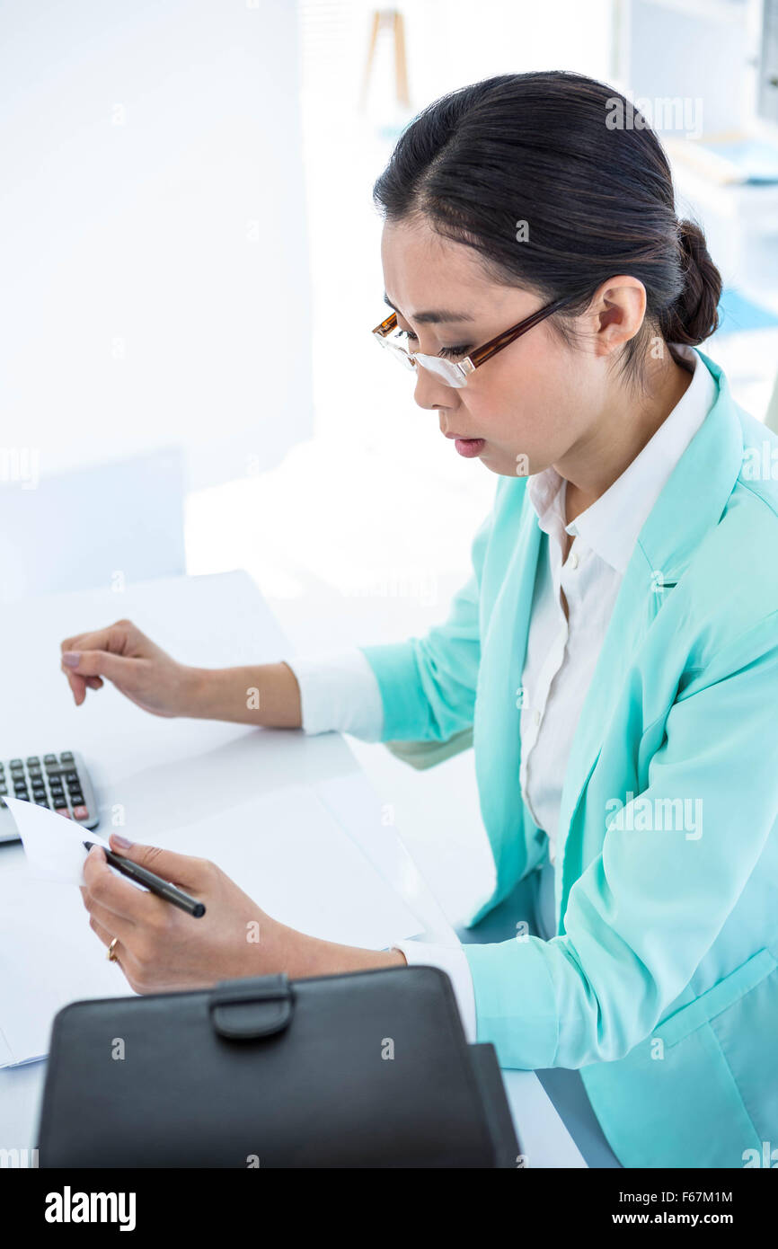 Business woman taking down notes Stock Photo - Alamy