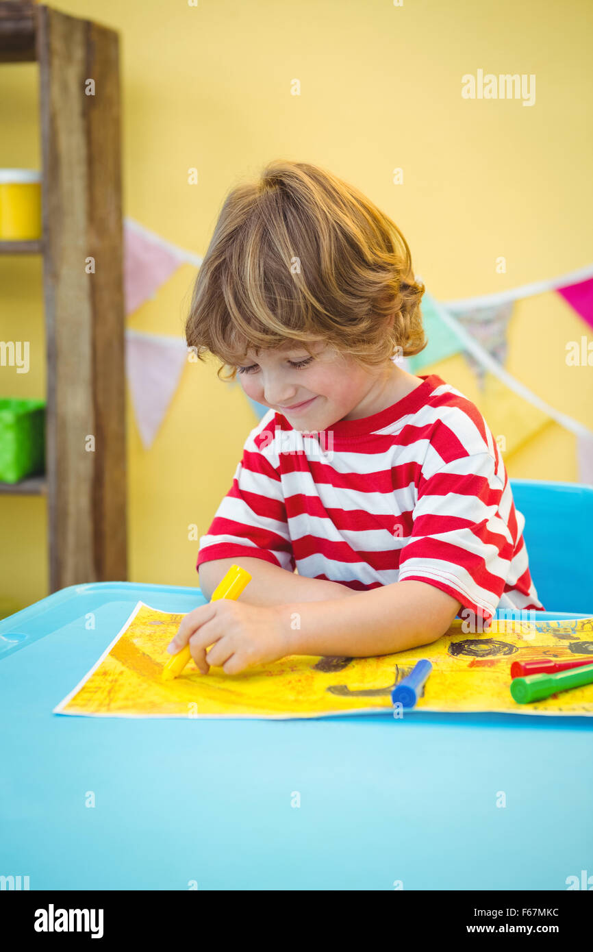 Small boy colouring in his picture Stock Photo - Alamy