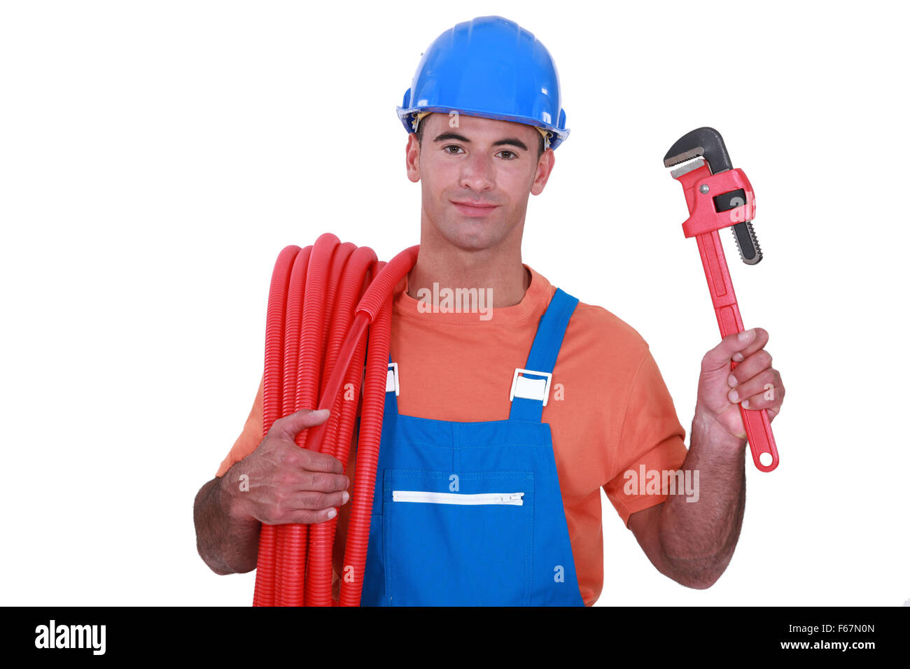 Plumber with a tool Stock Photo - Alamy