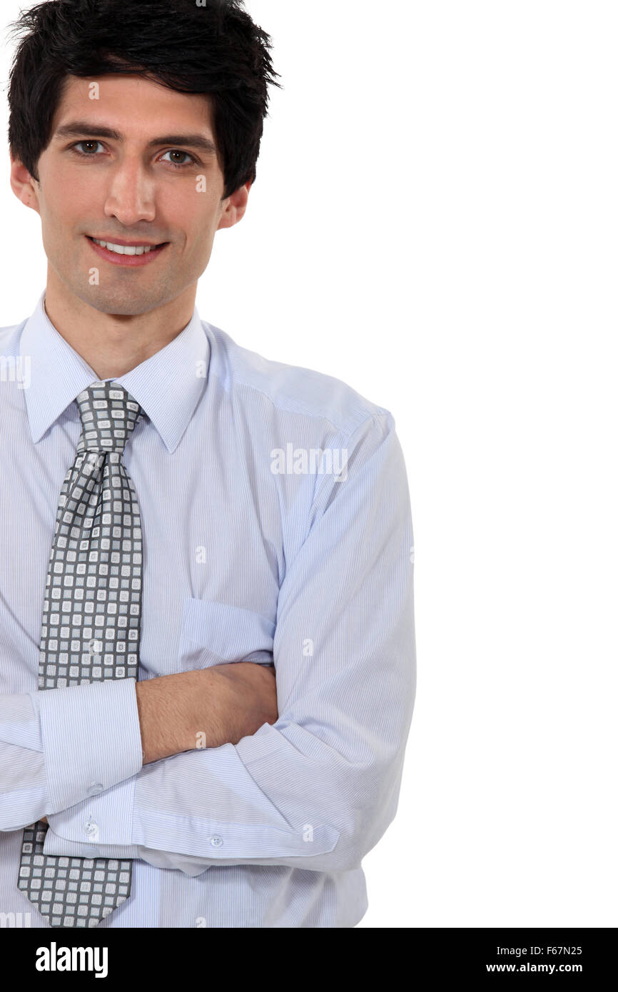 handsome businessman cross-armed Stock Photo - Alamy