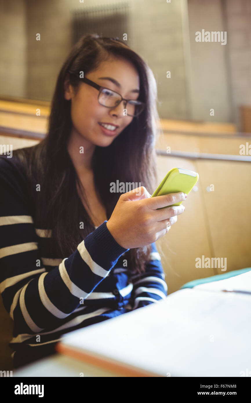 Happy female student using smartphone hi-res stock photography and ...